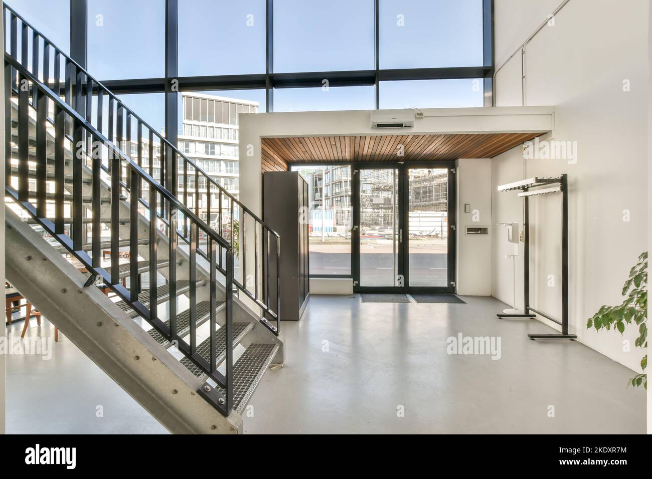 stairs in a light modern entrance building with big windows Stock Photo ...