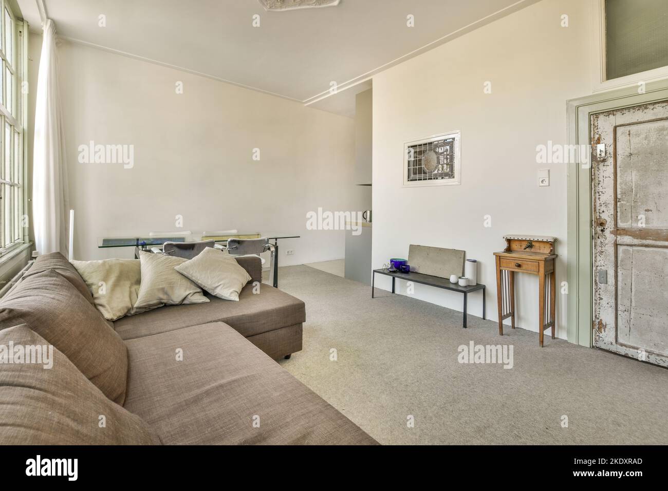 Interior of modern home with furniture next to a bright window Stock ...