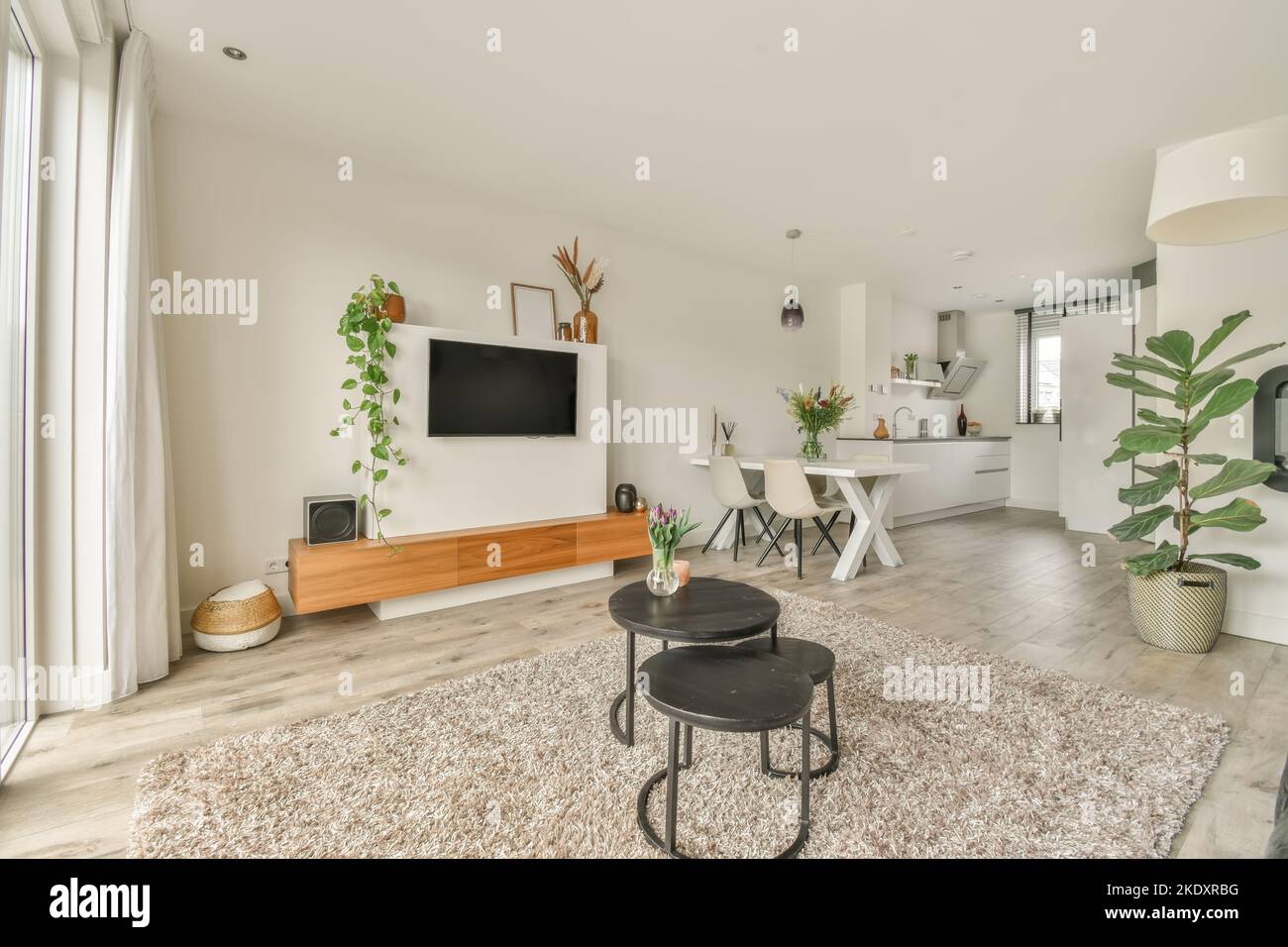 Interior of modern home with furniture next to a bright window Stock ...