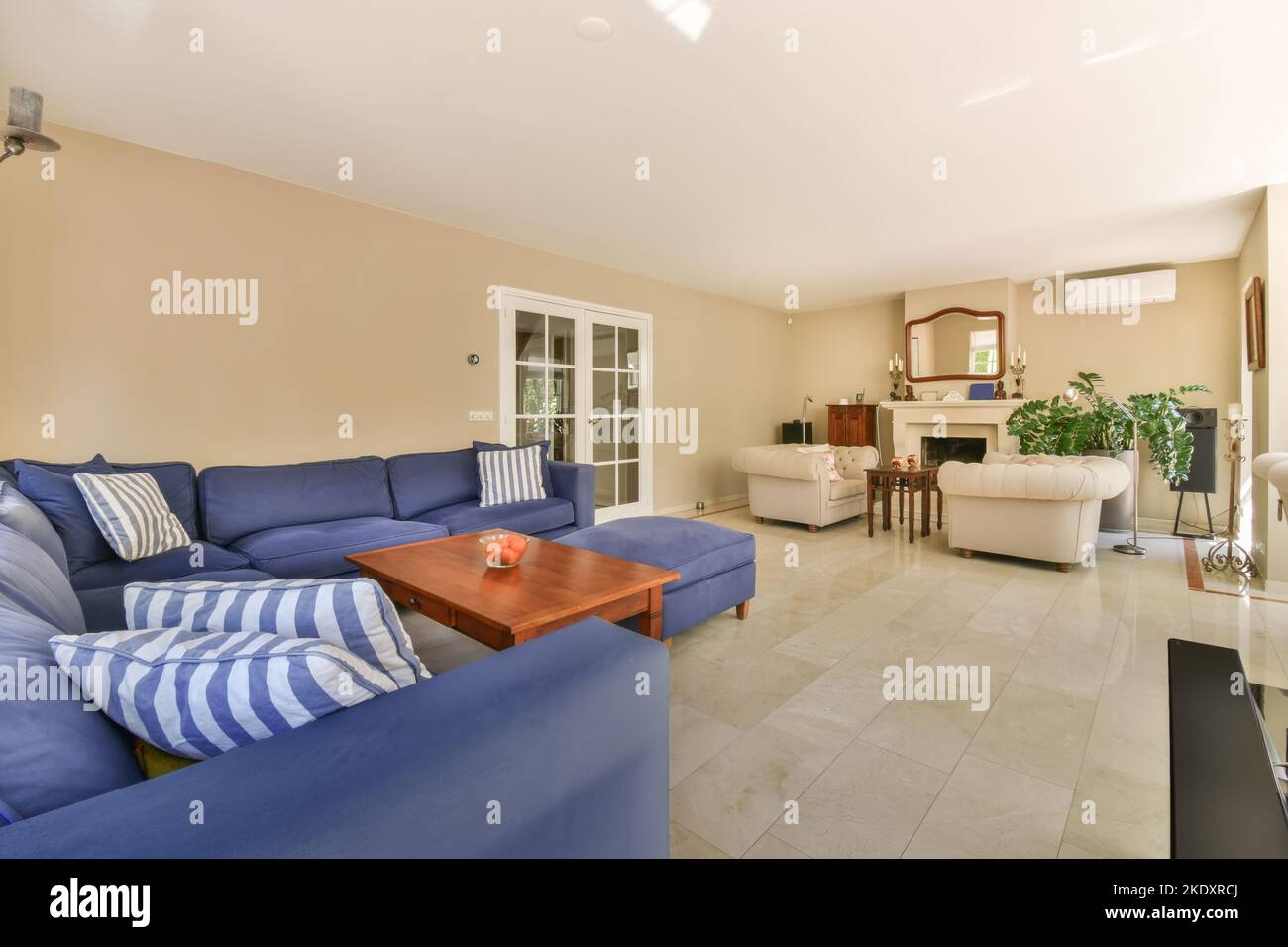 Interior of modern home with furniture next to a bright window Stock ...