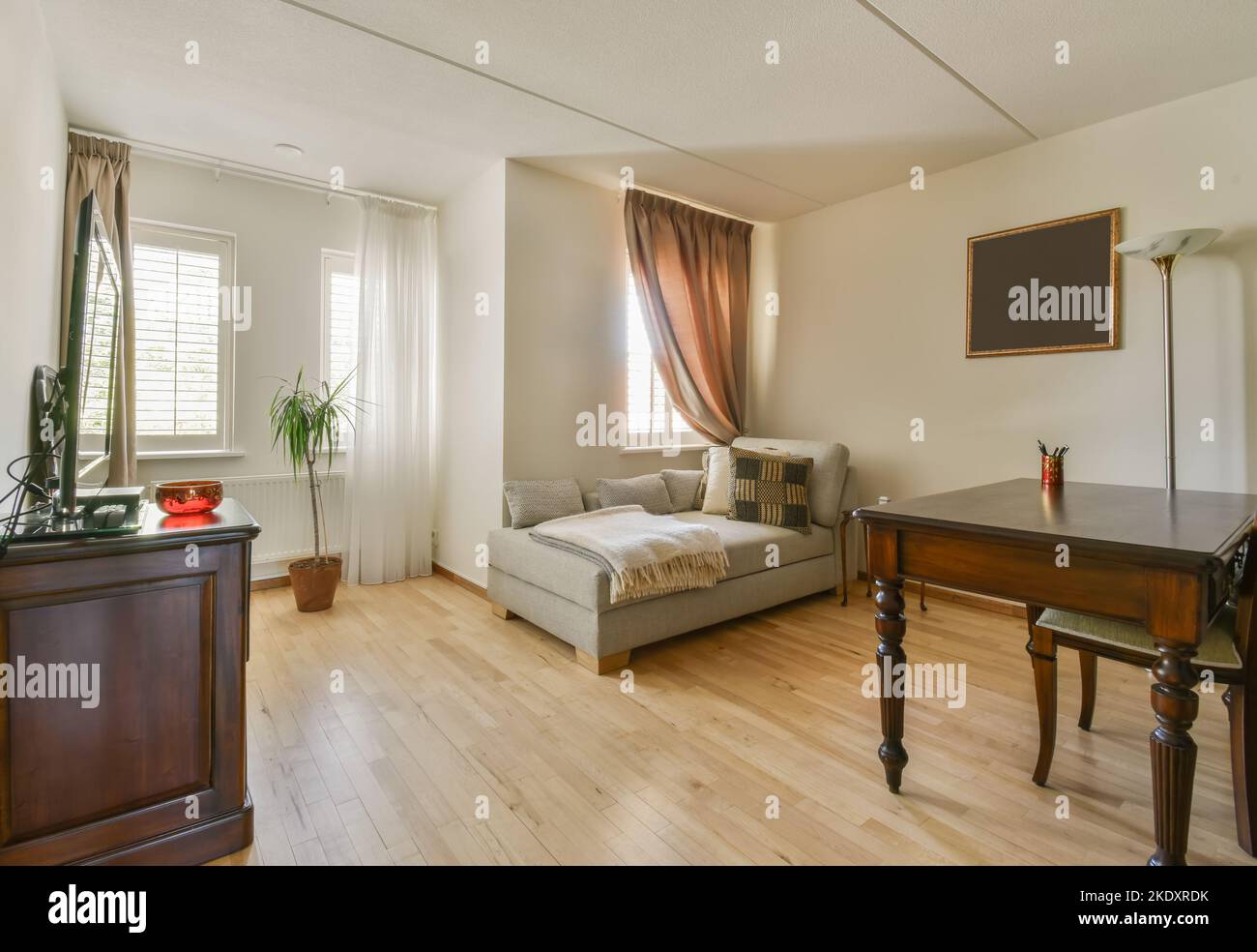 Interior of modern home with furniture next to a bright window Stock ...