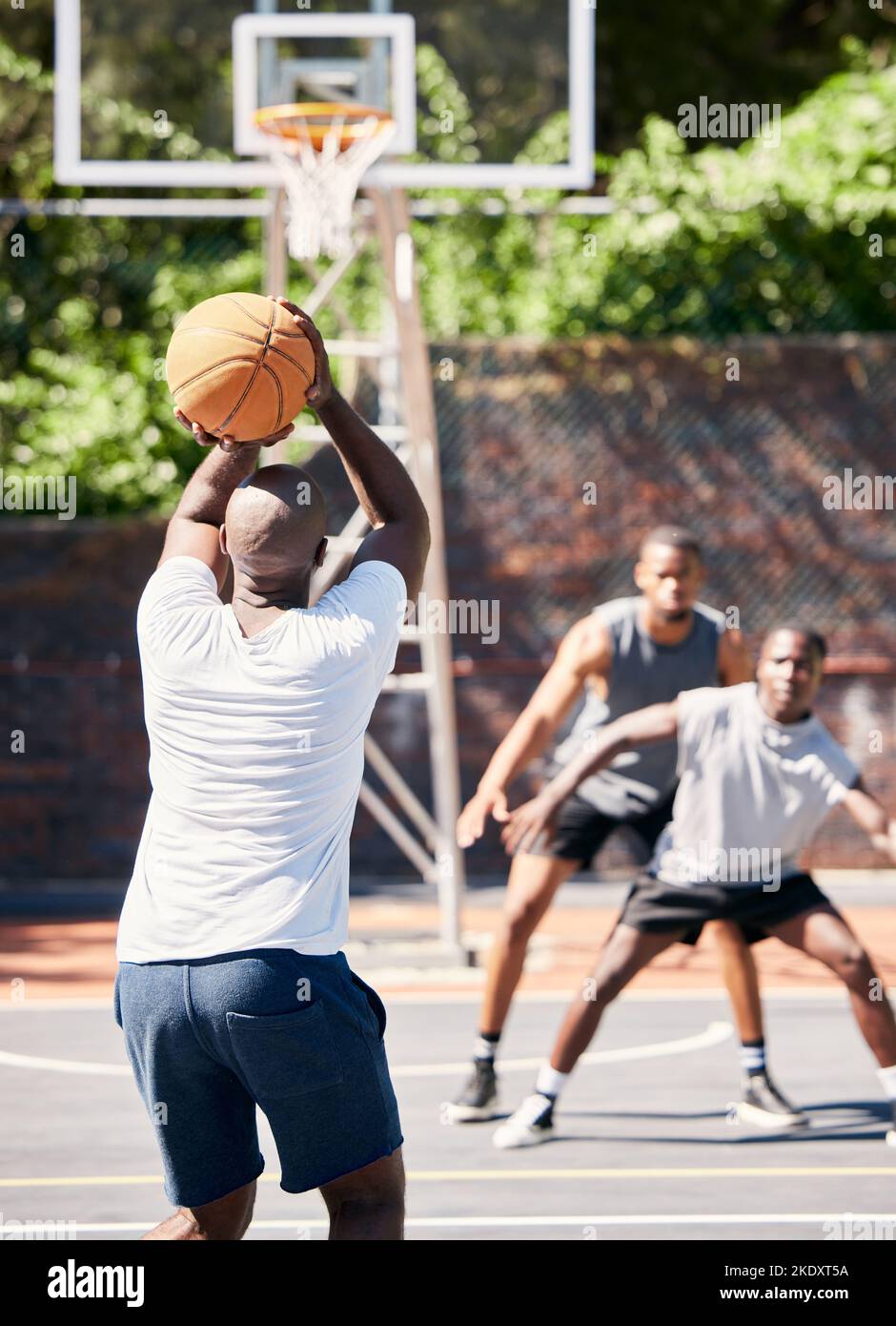 Basketball, sports and athlete scoring during game or training on an ...