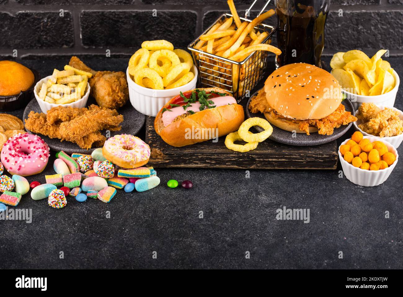 Assortment of various unhealthy junk food Stock Photo - Alamy