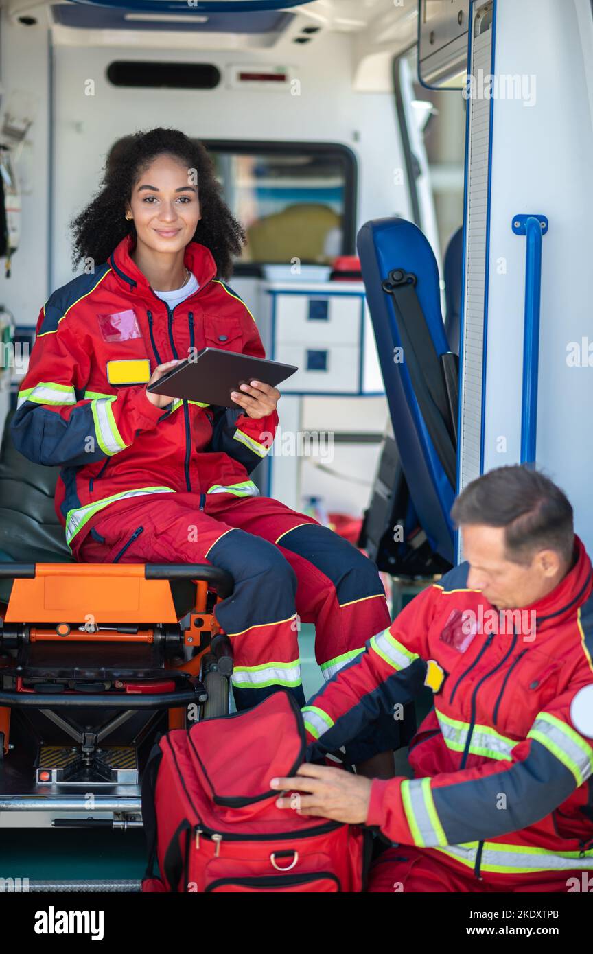 Paramedical staff preparing for their work shift Stock Photo - Alamy