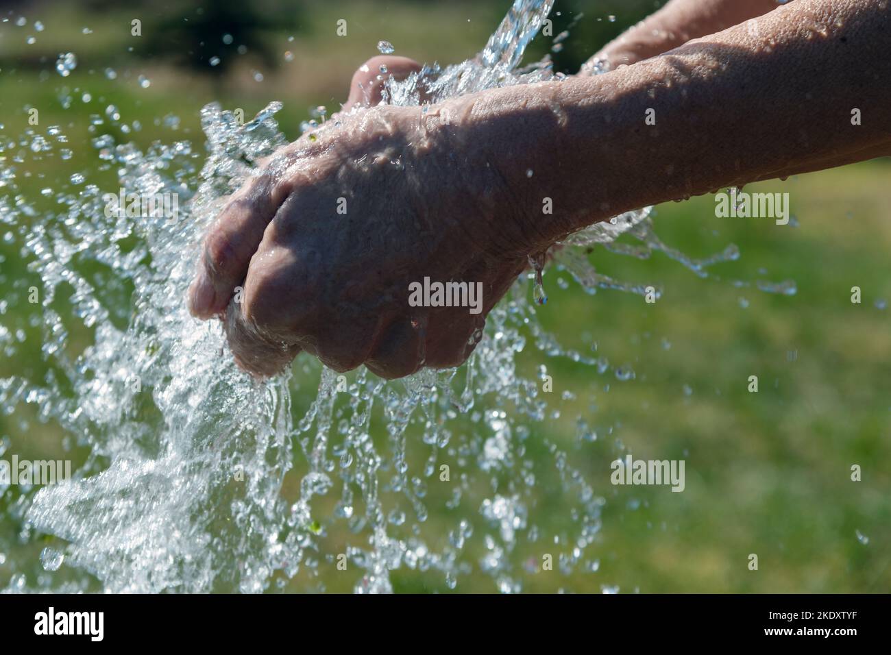Washing of hands in the outdoors Stock Photo - Alamy