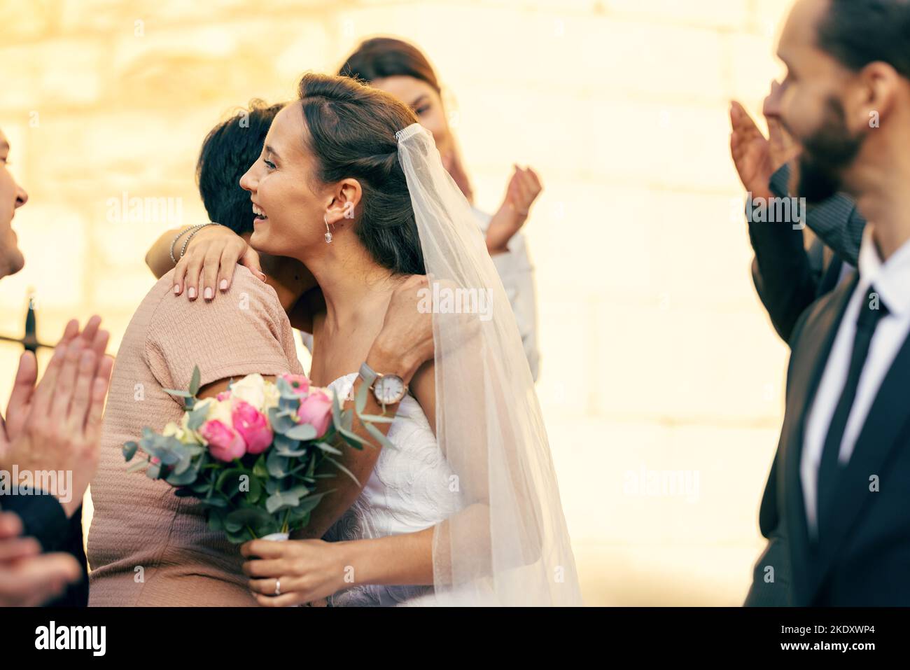 Wedding, marriage and bride hug family guests with a smile while leave ...