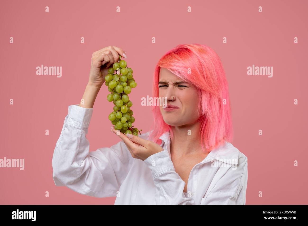 Woman disgust eating hi-res stock photography and images - Alamy