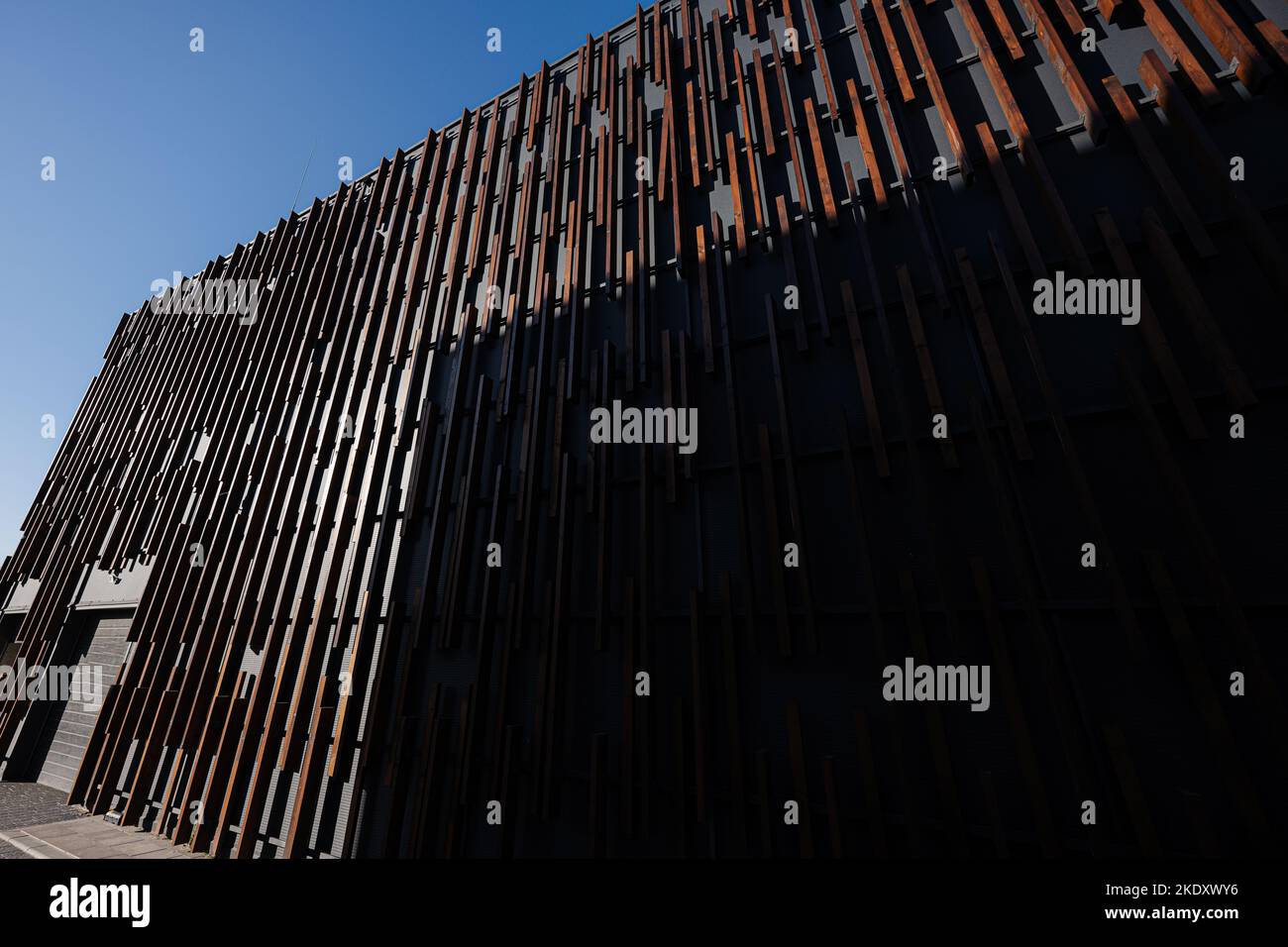 Wooden decorative carved building facade in sunlight Stock Photo - Alamy
