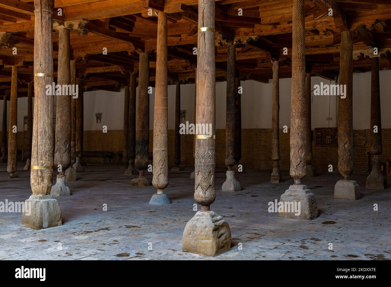 Ancient carved wooden columns in the medieval Juma mosque. Khiva ...