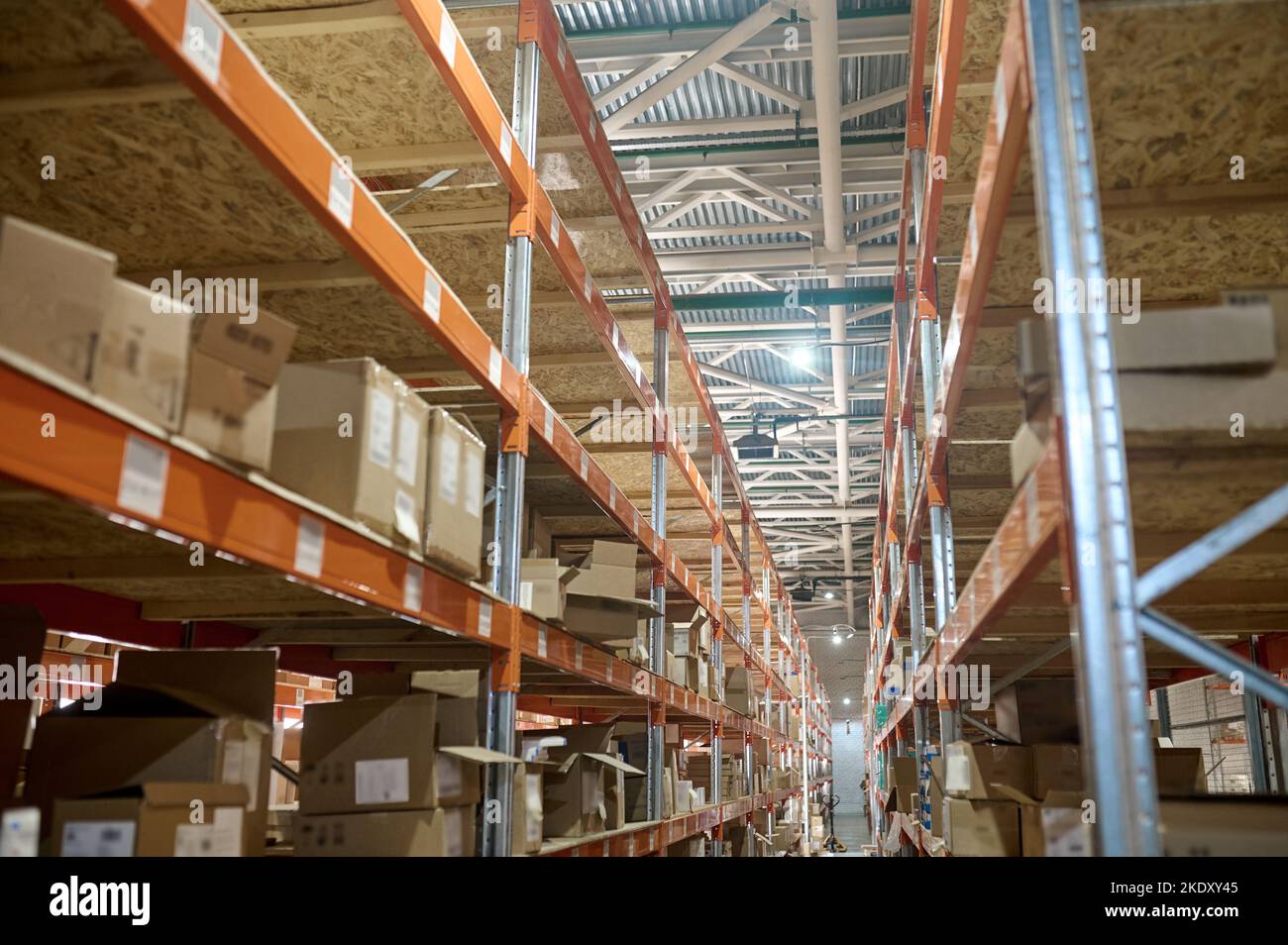Goods in shipping cartons on the stockhouse shelves Stock Photo - Alamy