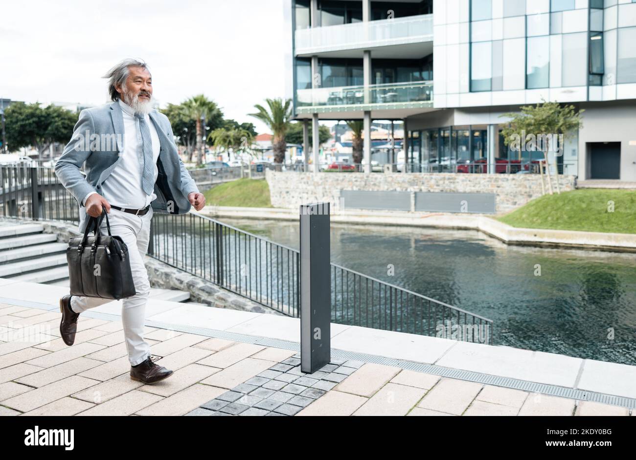 Businessman, running and work time in the city for urgent meeting ...