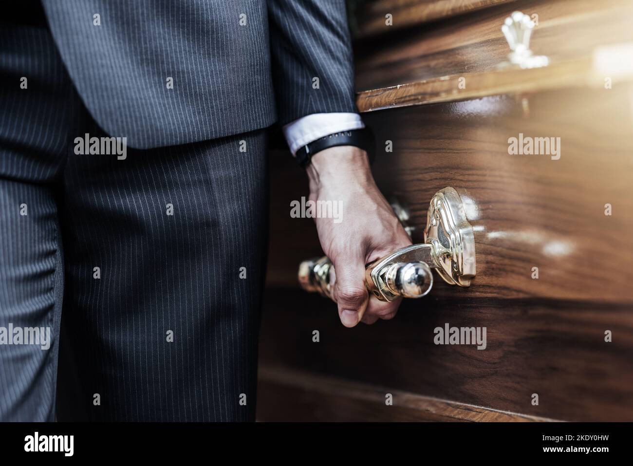 Funeral, man hands and holding coffin at a sad, death and church even ...