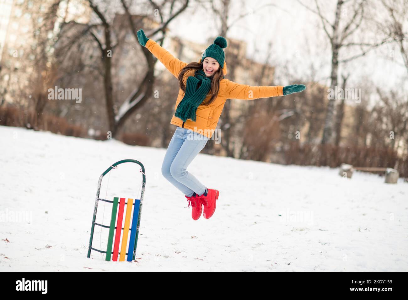 Full length body size view of attractive cheerful pre-teen girl wearing ...