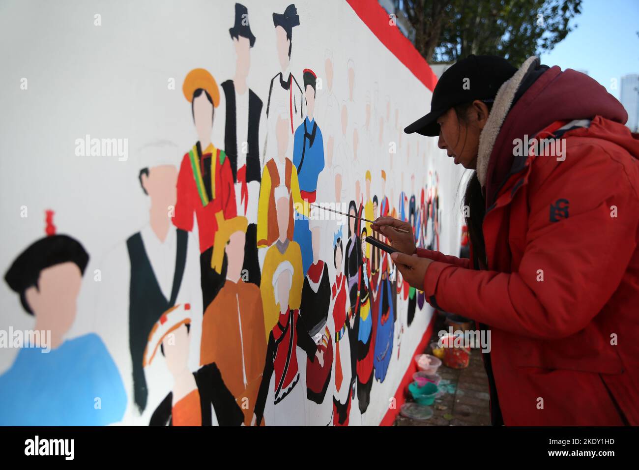 Wall paintings with folk customs and 56 ethnic groups in Fuqiang ...