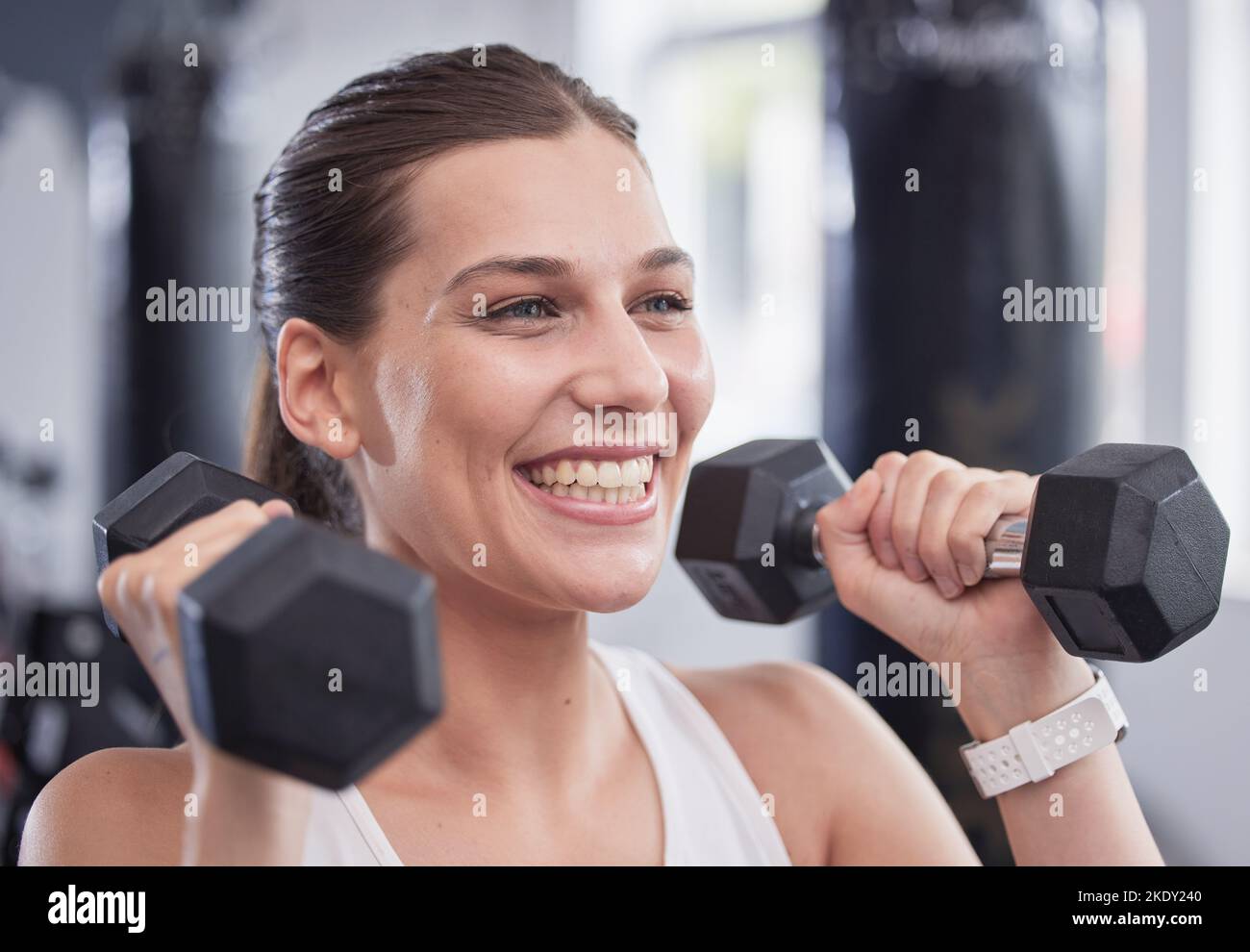 Fitness, exercise and woman with dumbbell in the gym doing workout ...