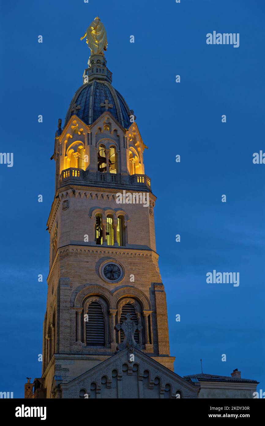 LYON, FRANCE, November 8, 2022 : Bell tower and the statue of the ...