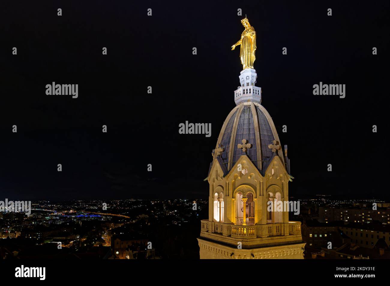 LYON, FRANCE, November 8, 2022 : Bell tower and the statue of the ...