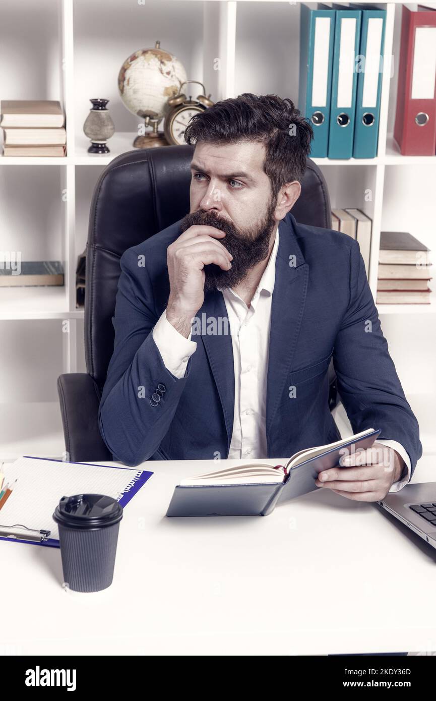 Busy boss in office. Check if i have time today. Man bearded hipster ...