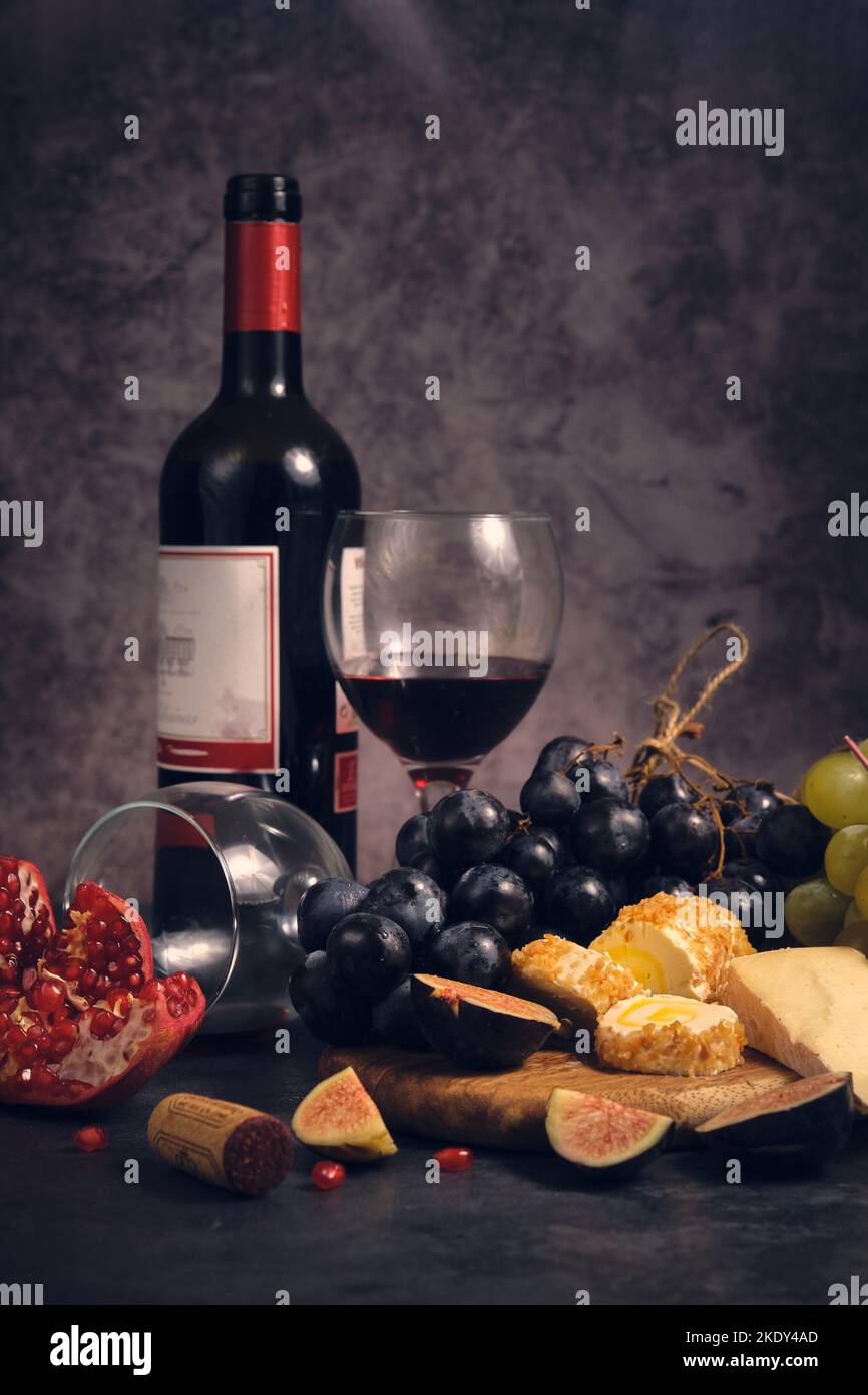 still life wine different cheeses and fruits Stock Photo - Alamy