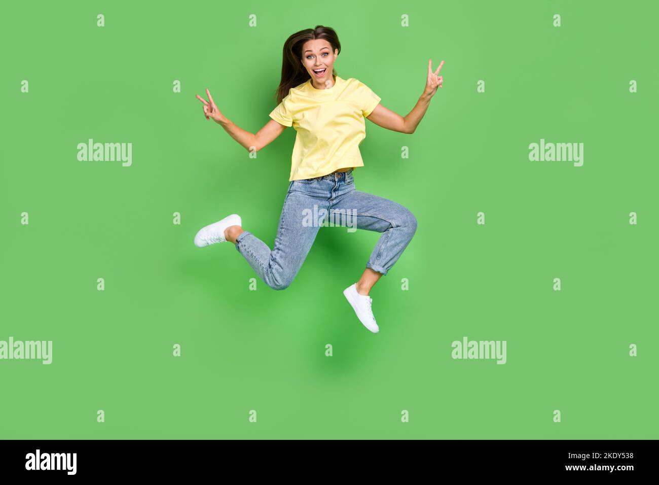 Full length photo of cheerful pretty lady rejoice jump two arm ...