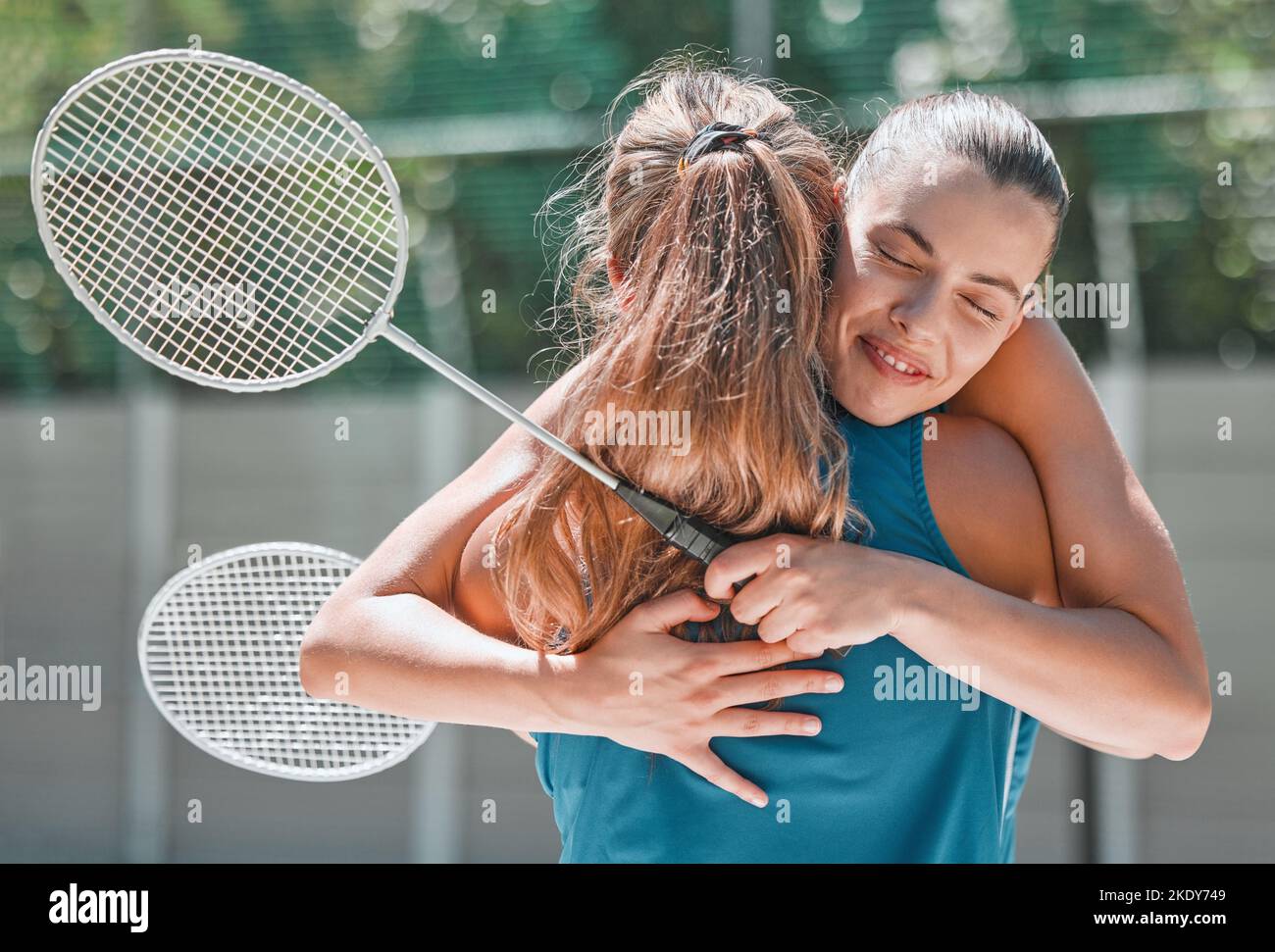 Badminton, success and friends hug after a sports match or training ...
