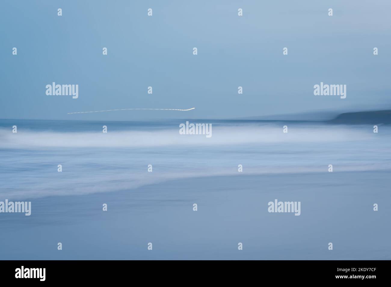 Slow shutter movement ICM of blue sunset at Tynemouth Longsands beach ...