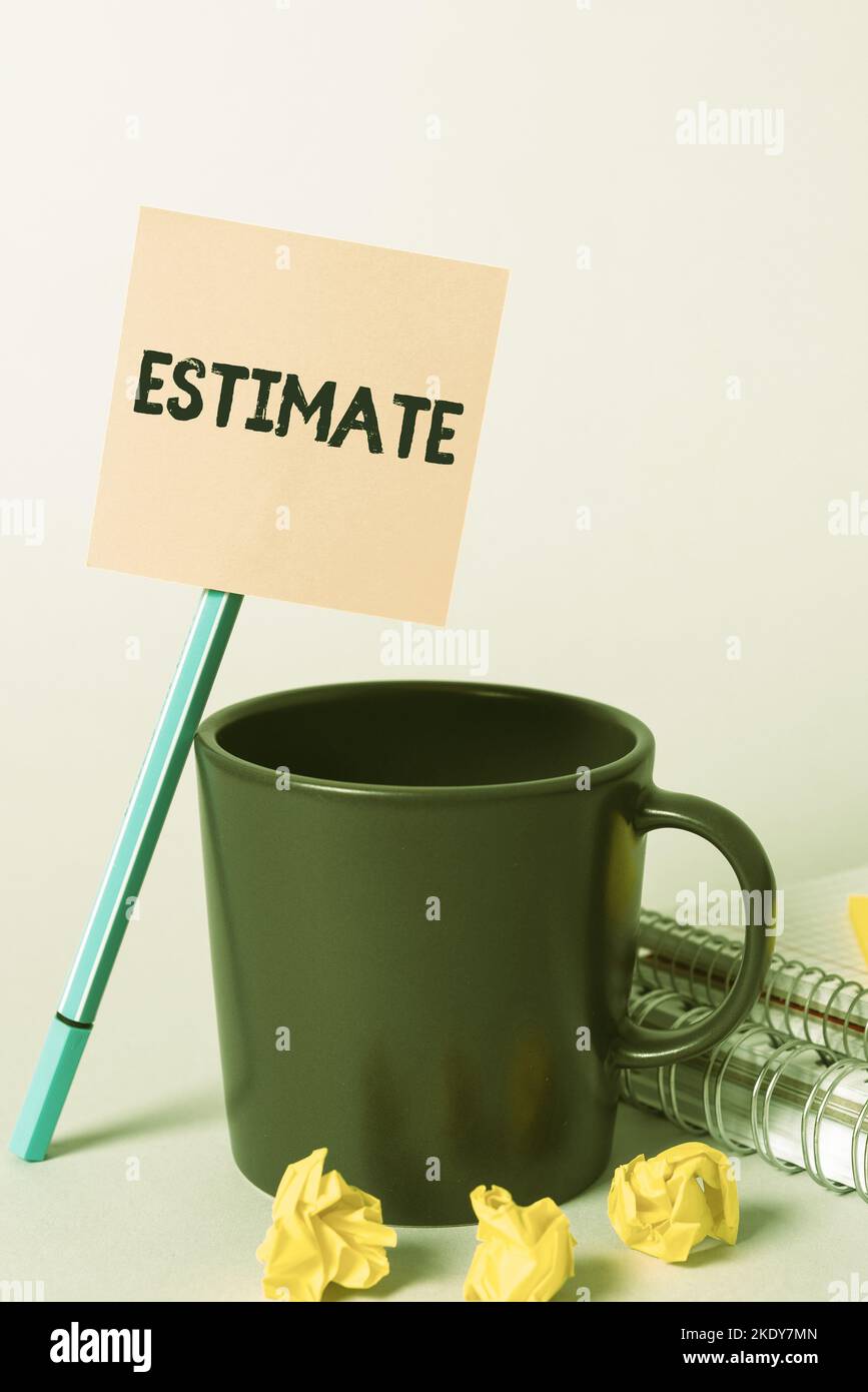 Hand writing sign Estimate, Business overview calculate or assess ...