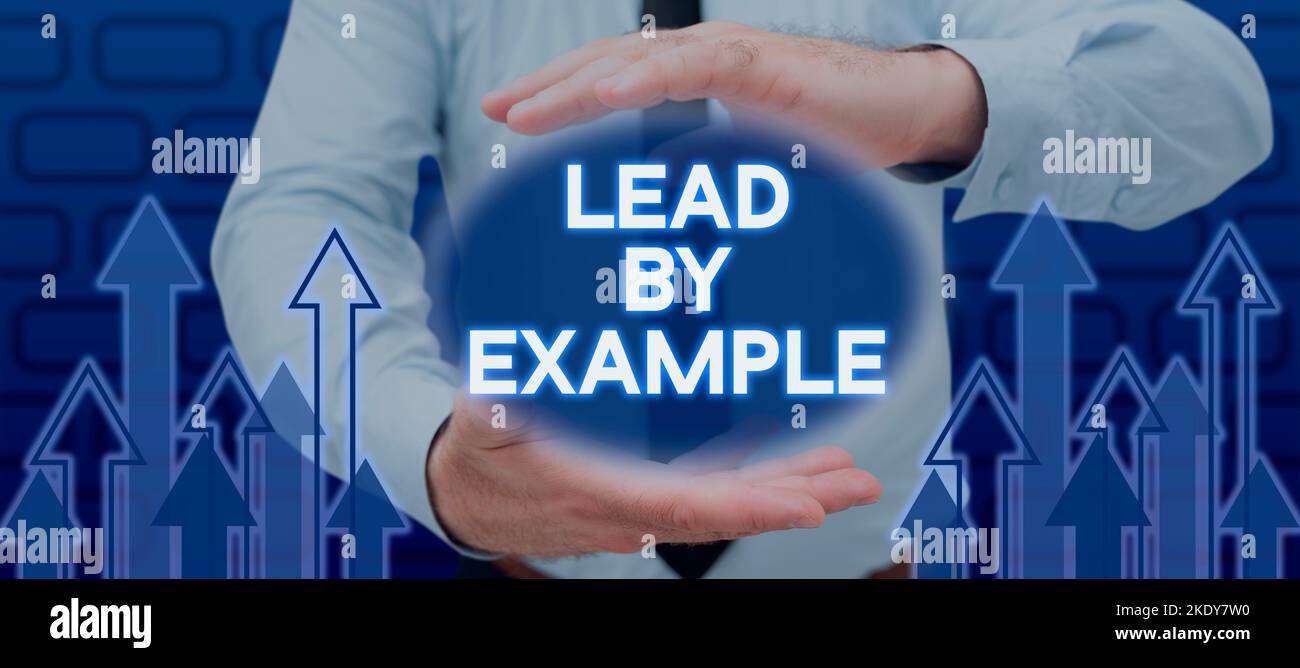 Text caption presenting Lead By Example, Concept meaning Be a mentor ...