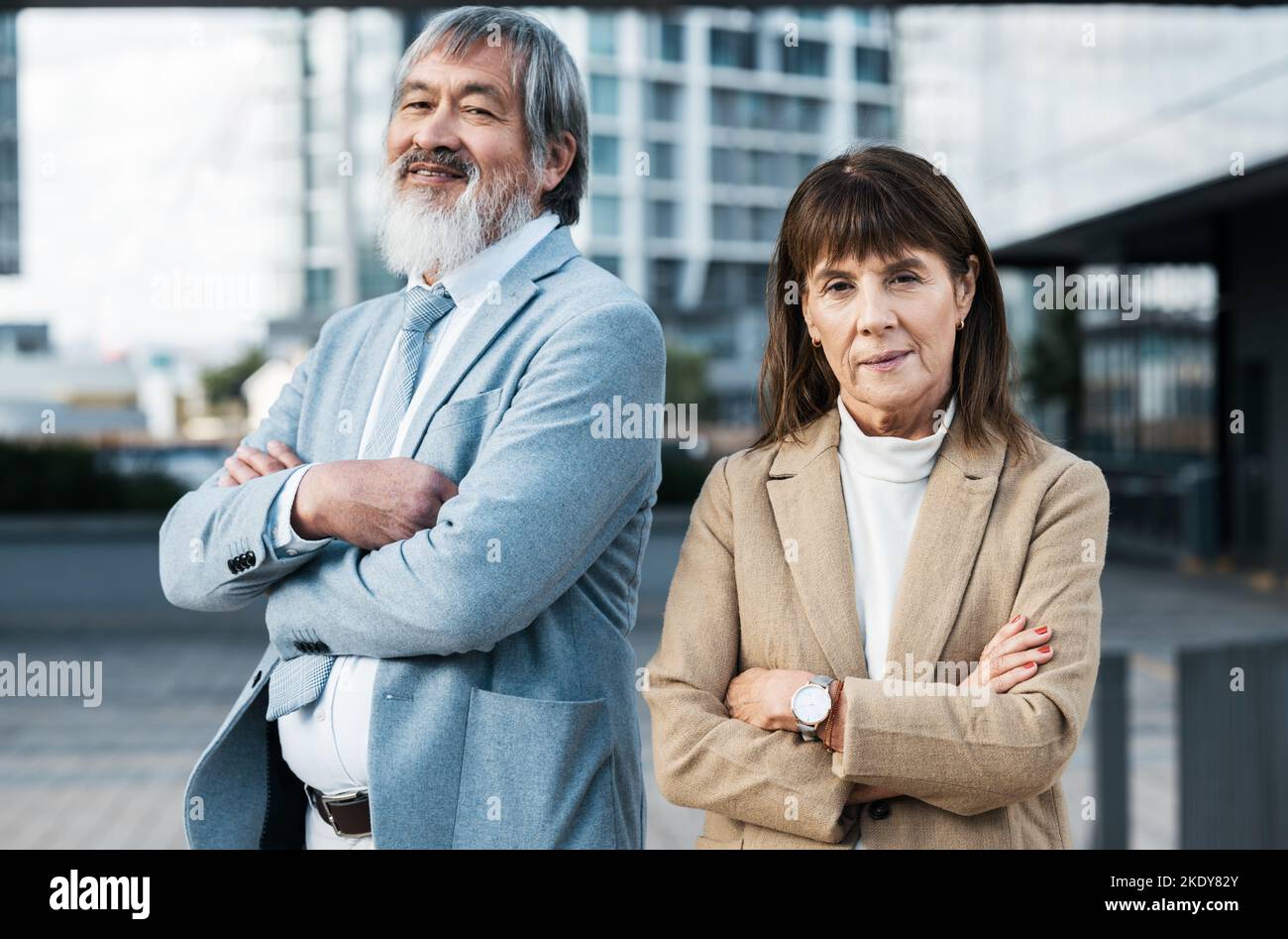 City portrait of diversity business team with crossed arms, confidence ...