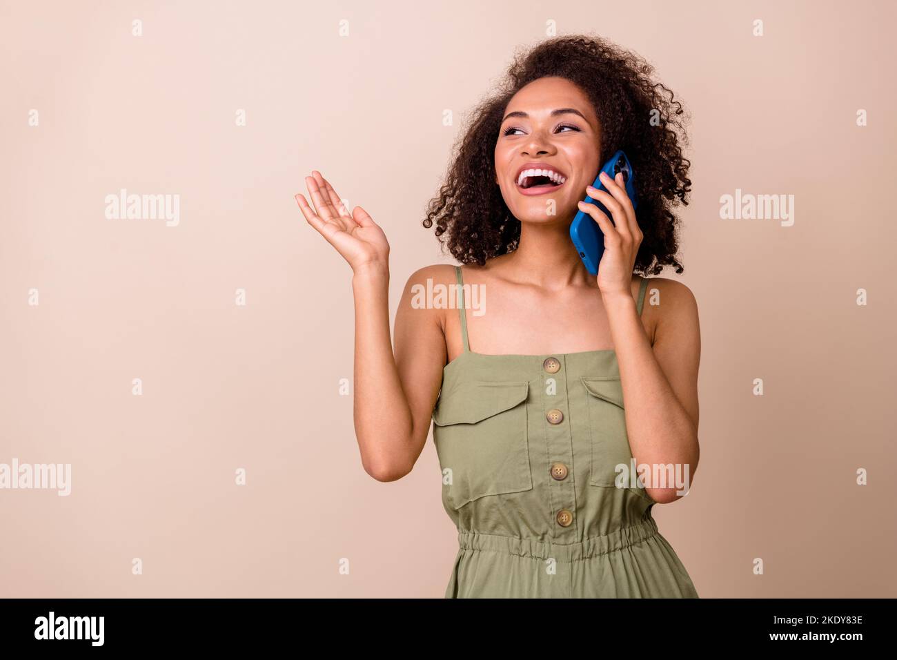 Photo of gorgeous cute pretty girl with curly hairstyle dressed khaki ...