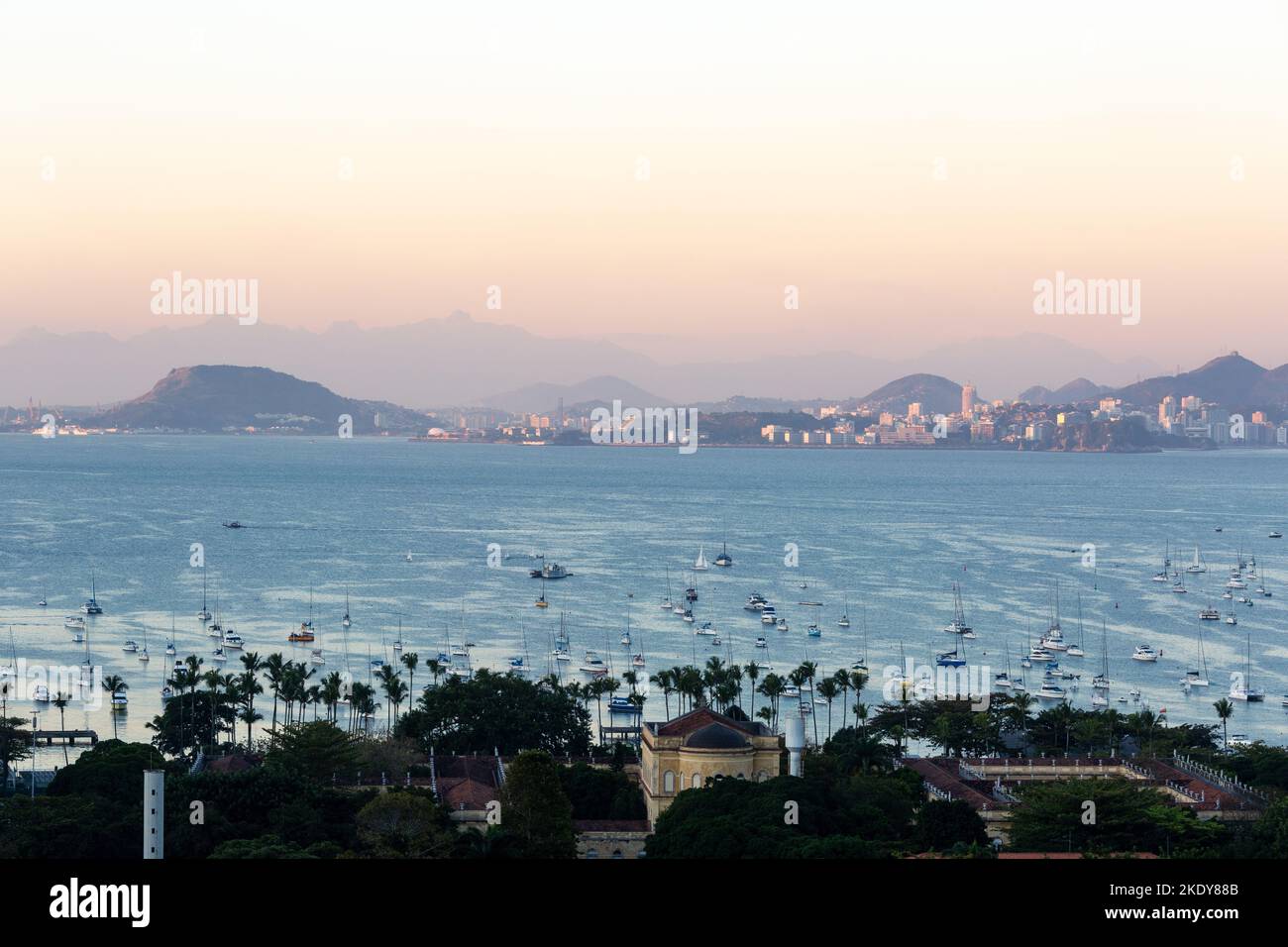 The Guanabara Bay with many boats in it and the Rio de Janeiro ...
