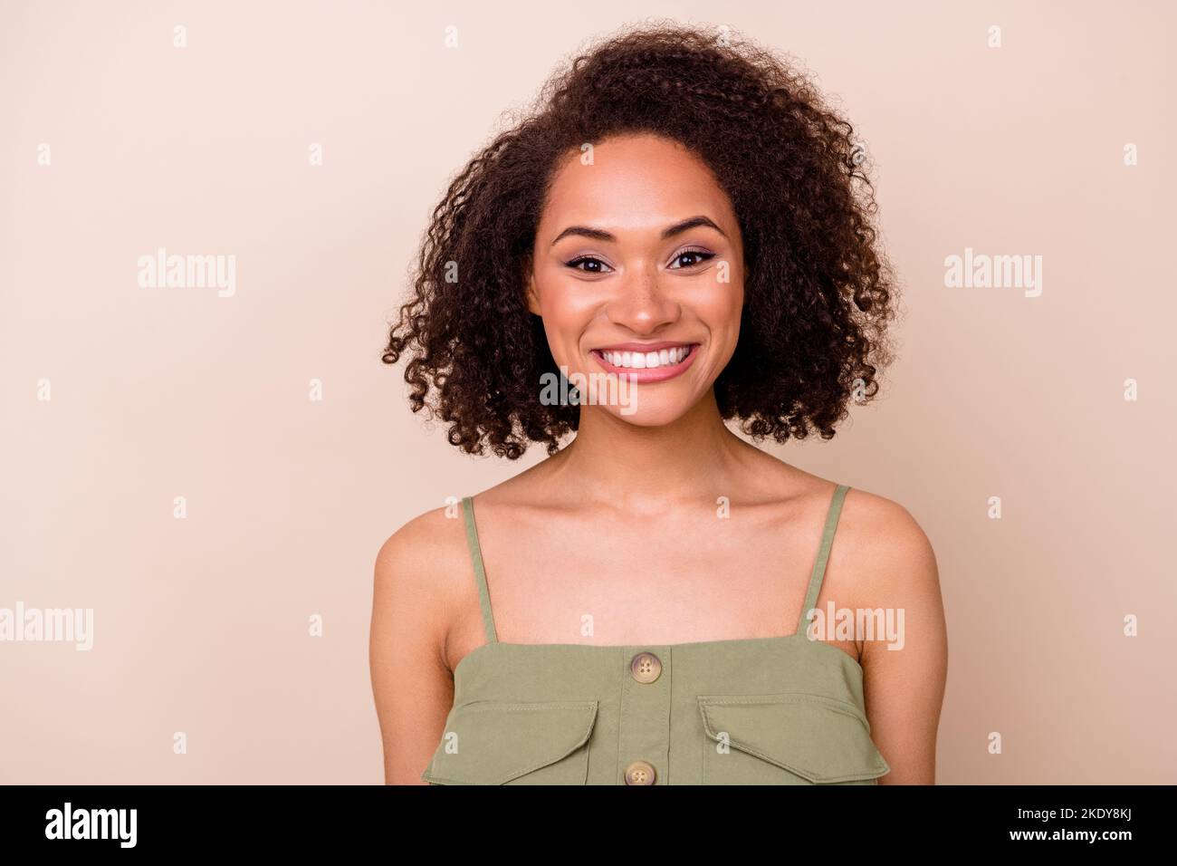 Close up photo of gorgeous optimistic girl curly hairdo beaming grin ...