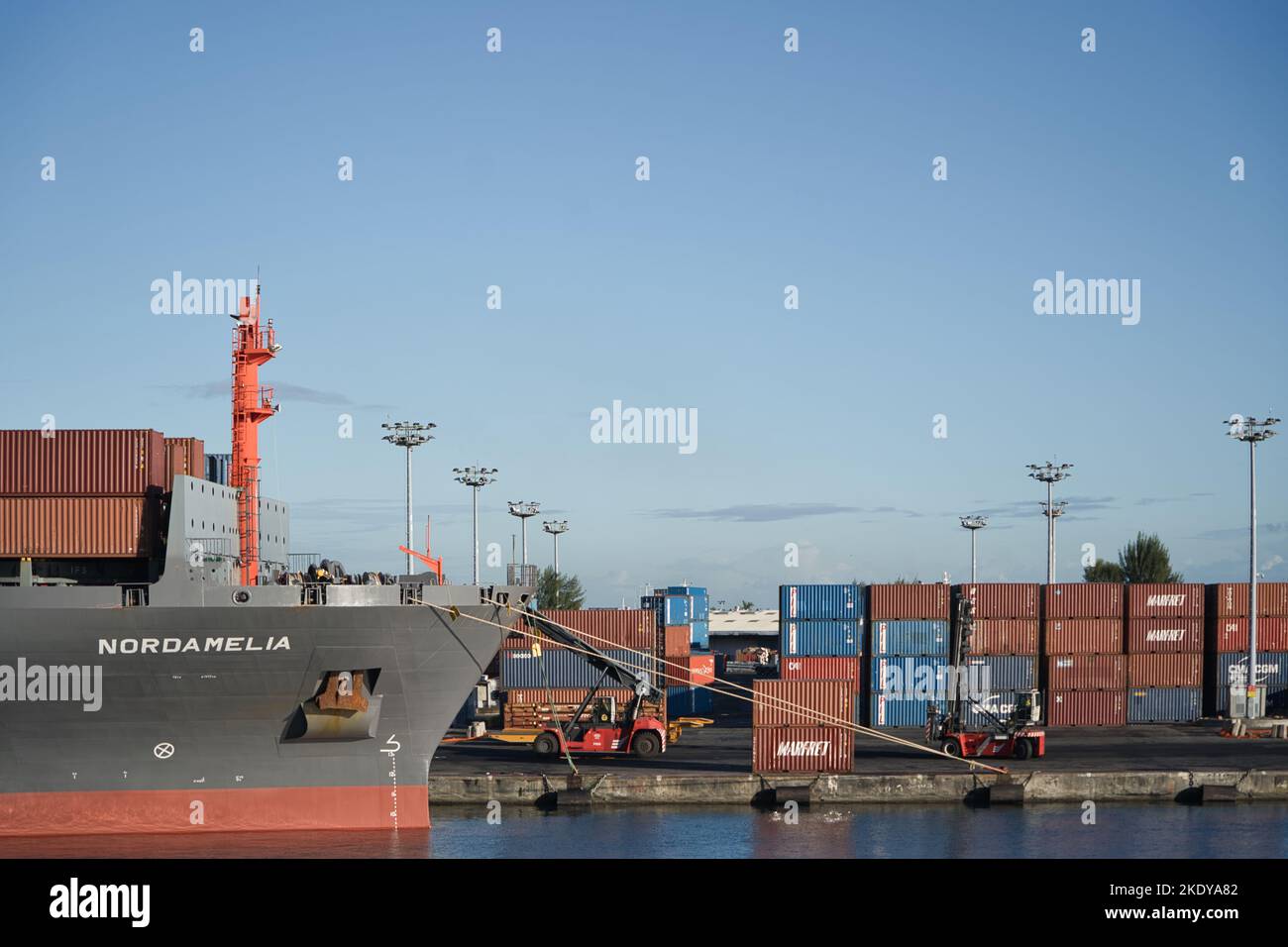 An anchored boat at the Papeete port Stock Photo - Alamy