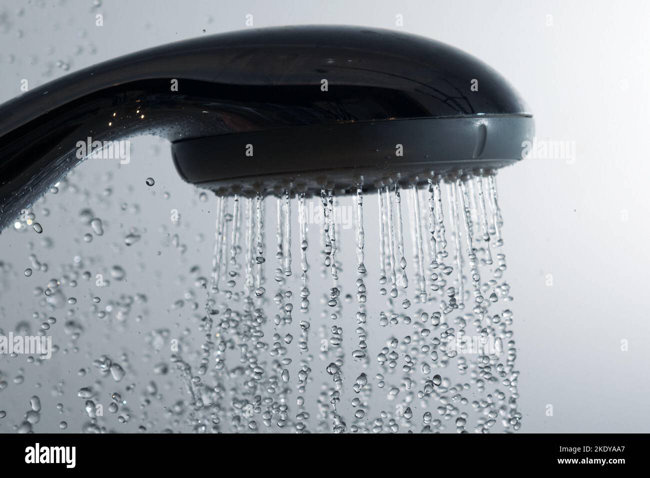 Shower head and flying water drops Stock Photo - Alamy