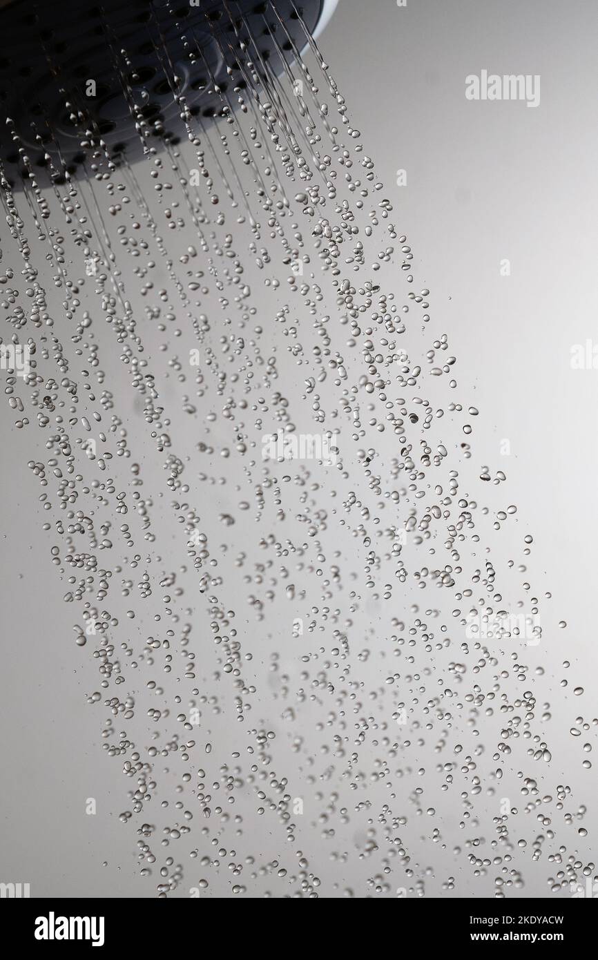 Shower head and flying water drops Stock Photo - Alamy