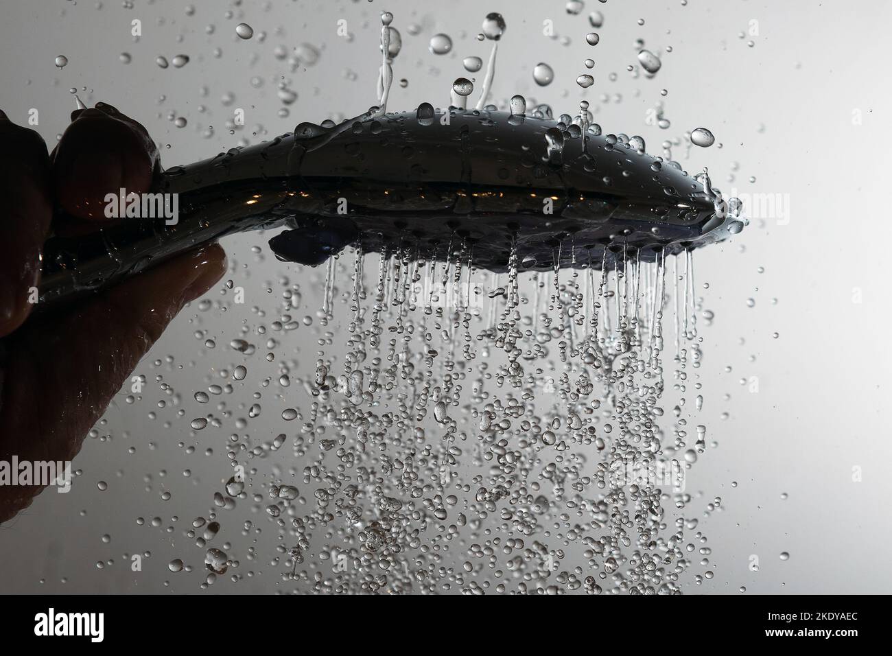 Shower head and flying water drops Stock Photo - Alamy