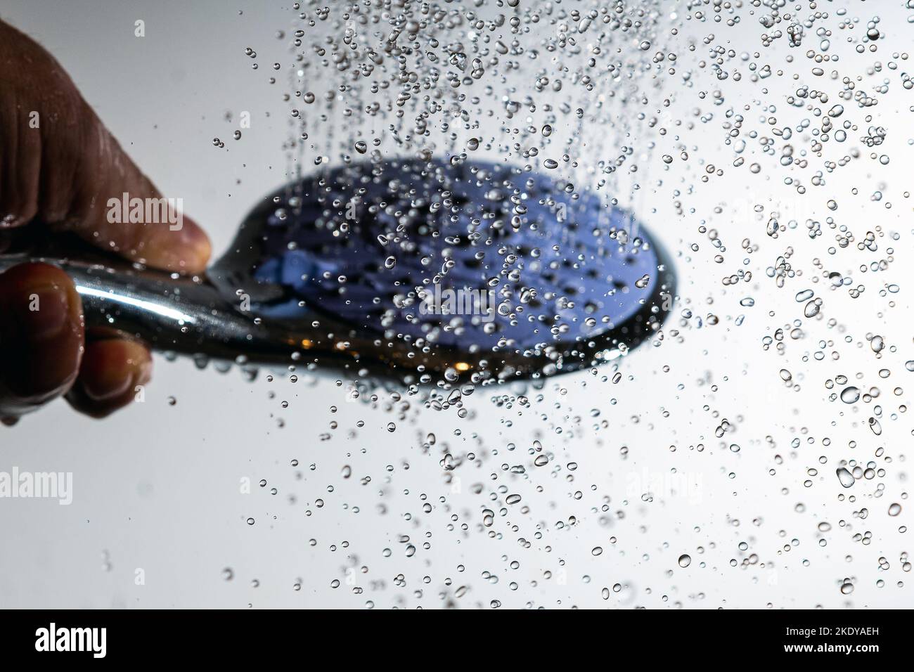 Shower head and flying water drops Stock Photo - Alamy