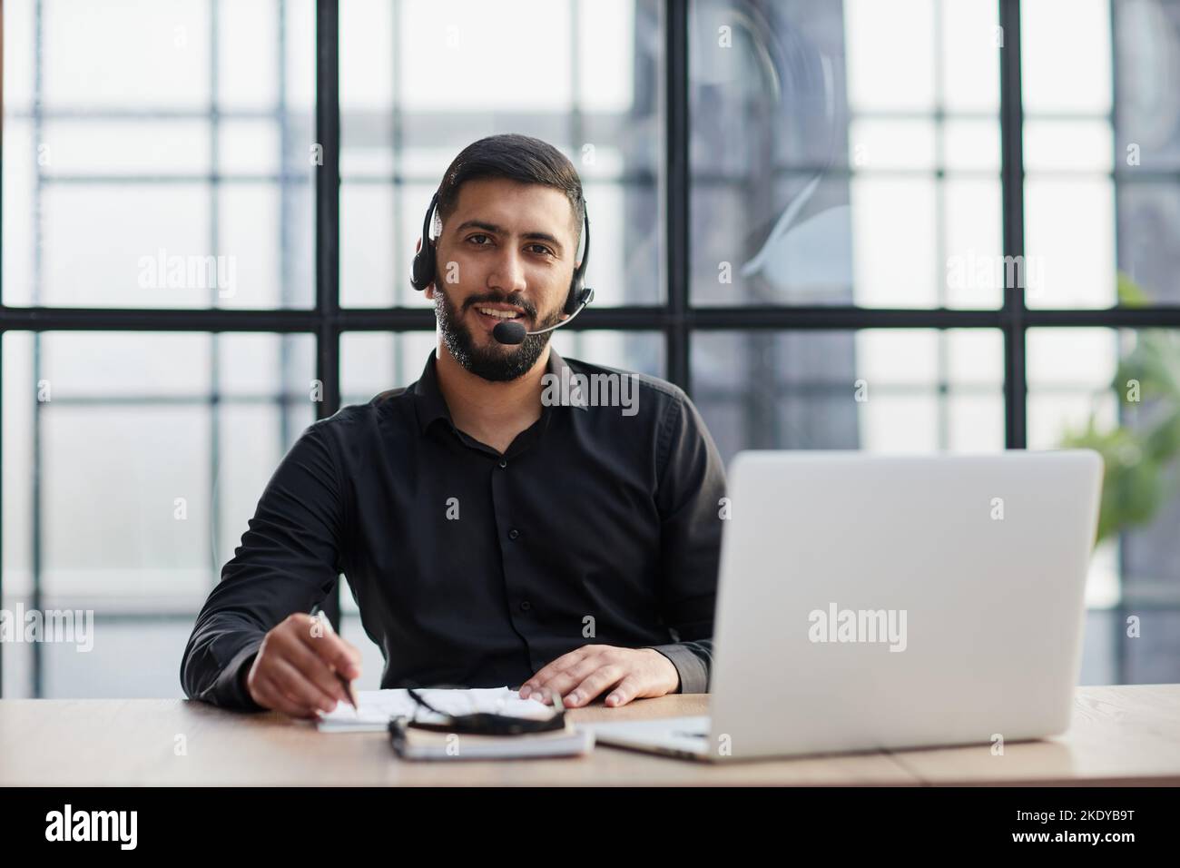 Business people wearing headset working hi-res stock photography and ...