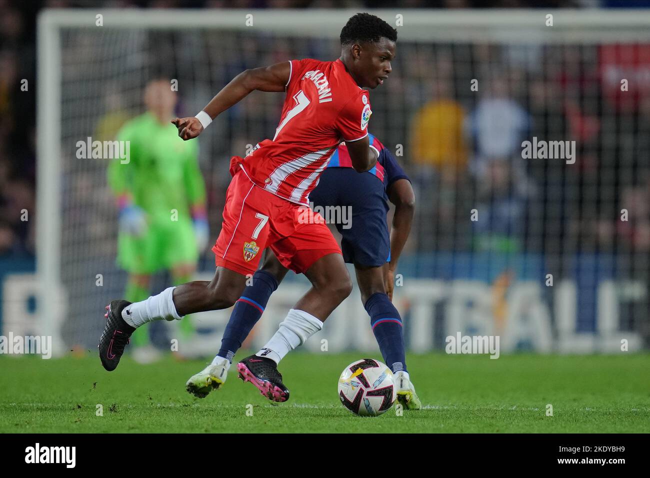 Largie Ramazani of UD Almeria and Ansu Fati of FC Barcelona during the ...