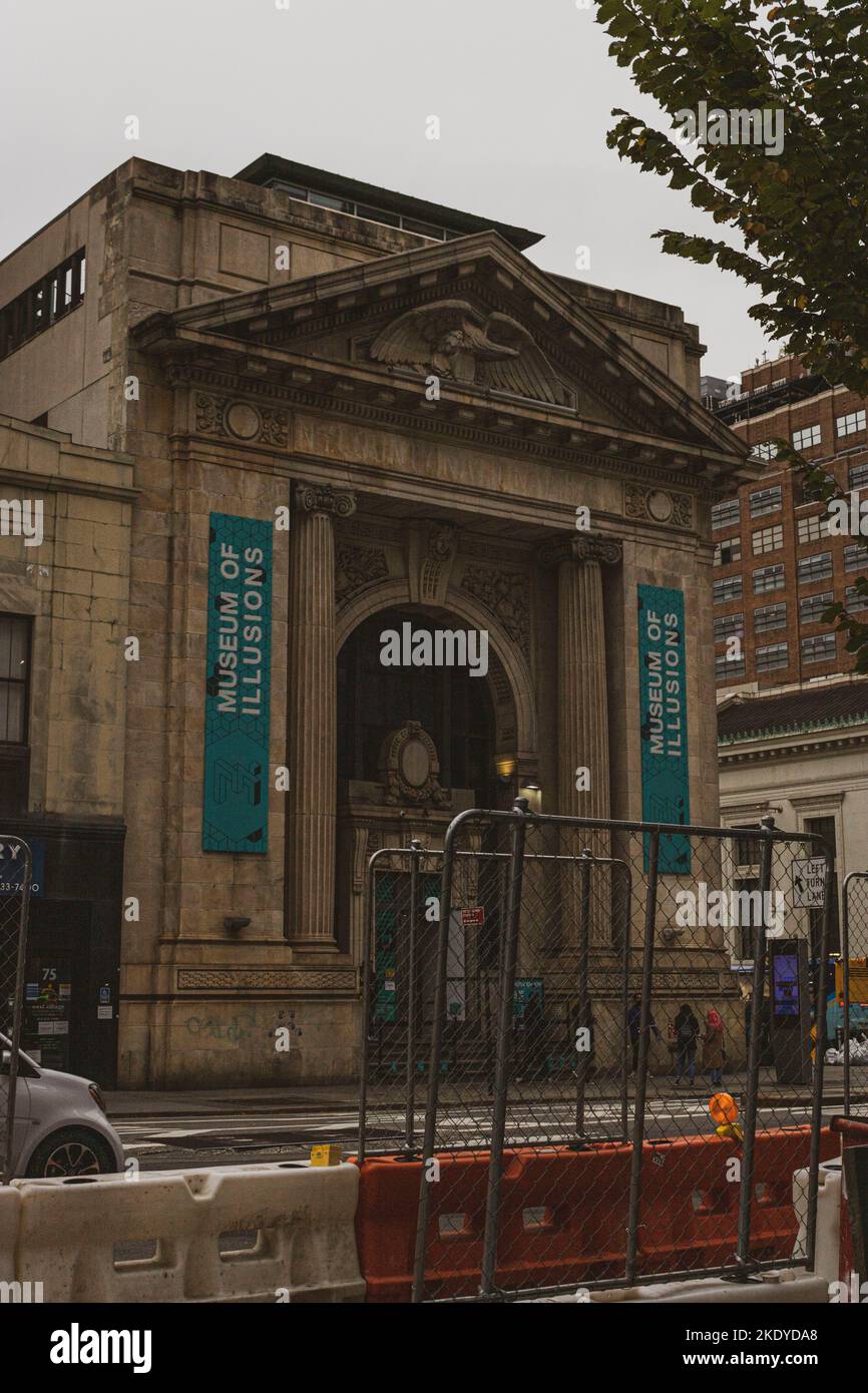 A vertical shot of the Museum of Illusions facade in New York City, USA ...