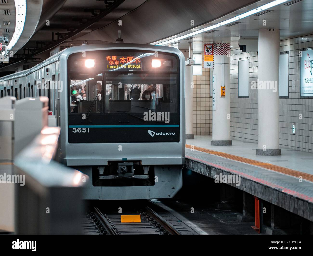 A subway train approaching the station in Japan Stock Photo - Alamy