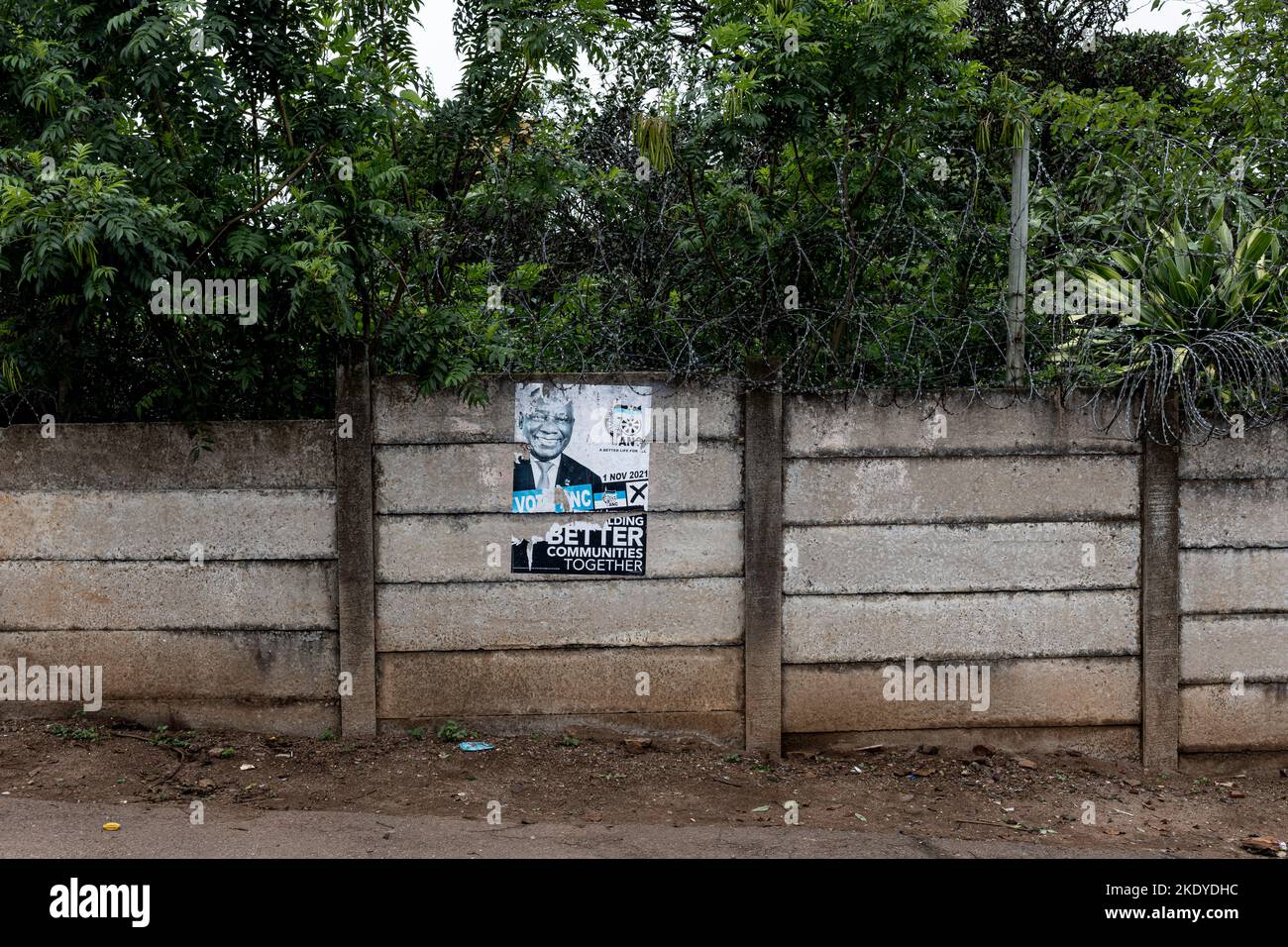 Fading ANC election posters are seen on a wall in eMbo township in ...