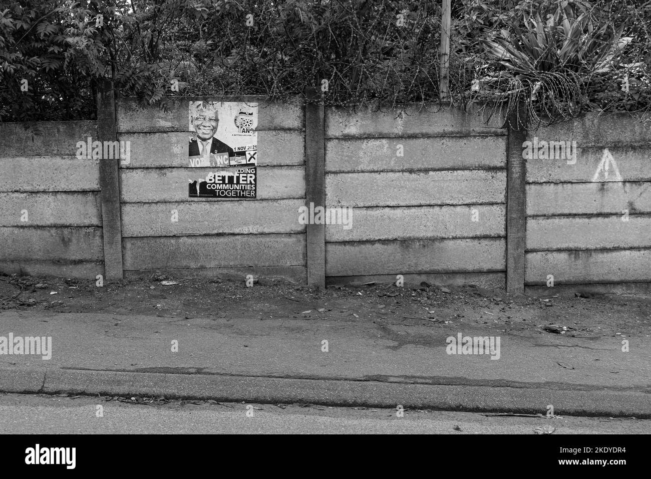 Fading ANC election posters are seen on a wall in eMbo township in ...