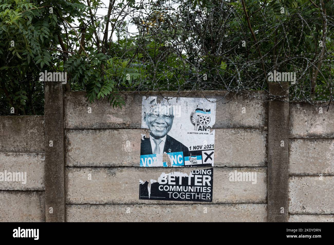 Fading ANC election posters are seen on a wall in eMbo township in ...
