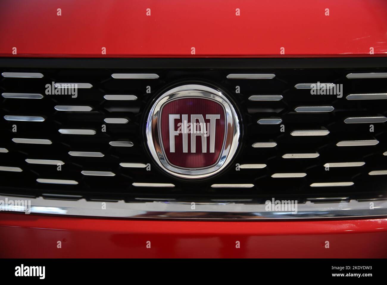 A closeup of a fiat car emblem on a red car Stock Photo - Alamy