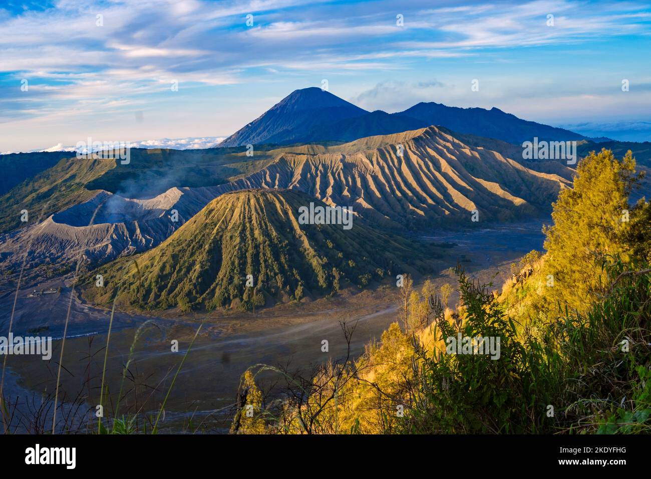 An aerial view of the volcanic crater and nearby mountains in East Java ...