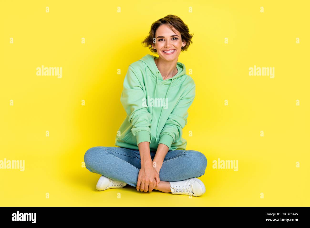 Full length photo of adorable sweet girl dressed green sweatshirt ...