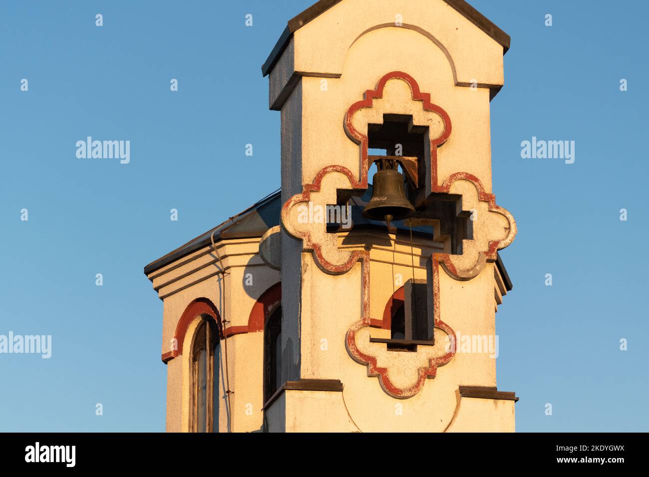 Church bell tower isolated against blue sky, Orthodox memorial church ...