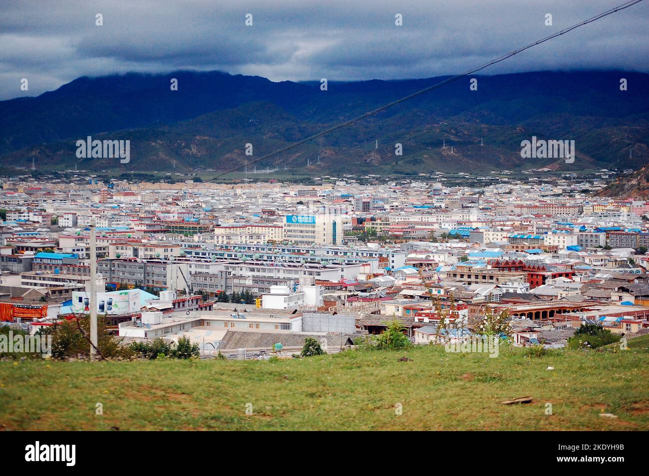 A beautiful landscape of a village with houses and mountains in a ...