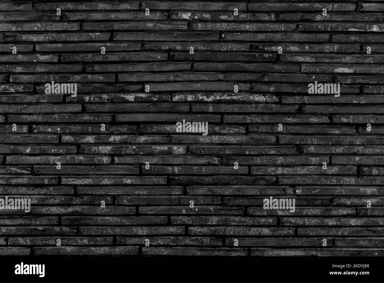 A seamless pattern of black brick wall Stock Photo - Alamy